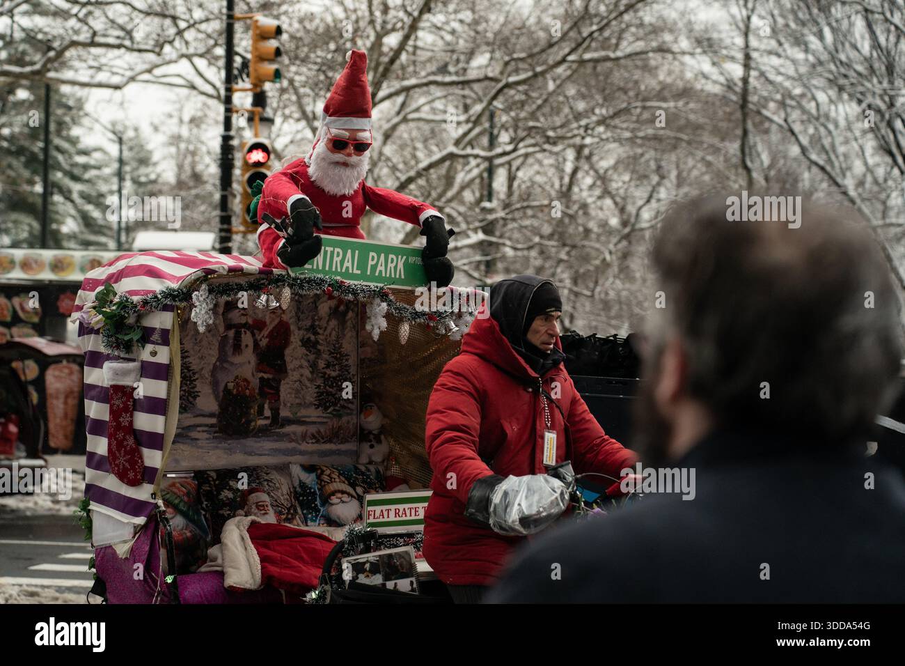 A Christmas-themed pedal taxi passes Central Park after an overnight ...