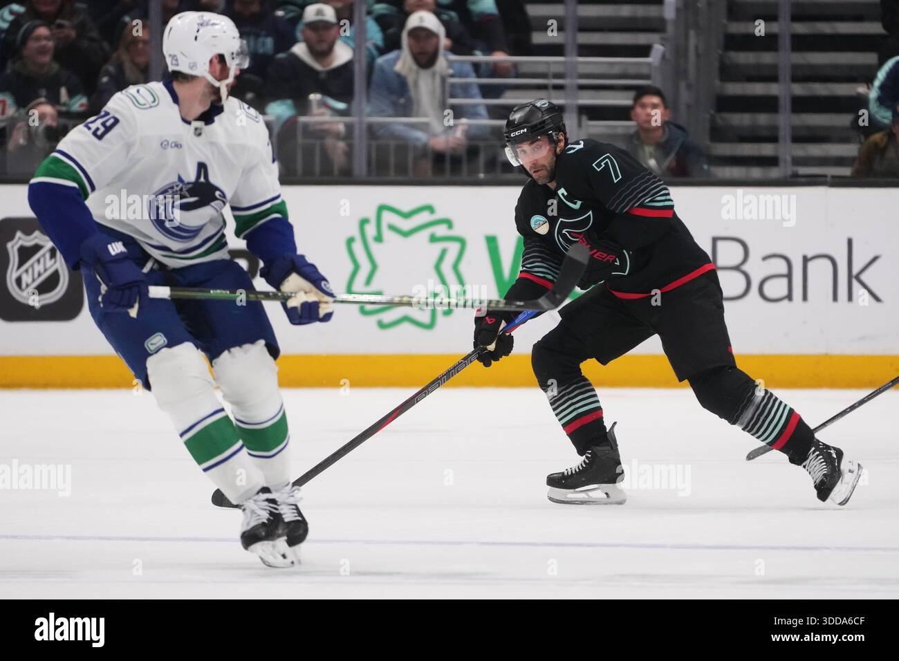 Seattle Kraken right wing Jordan Eberle (7) moves the puck as Vancouver ...