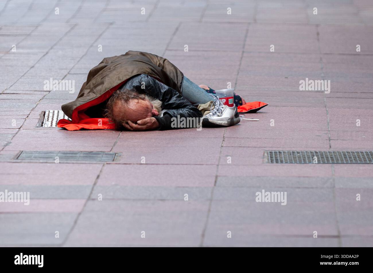 Toronto, ON, Canada - October, 15, 2025: Homeless man sleeping on a ...