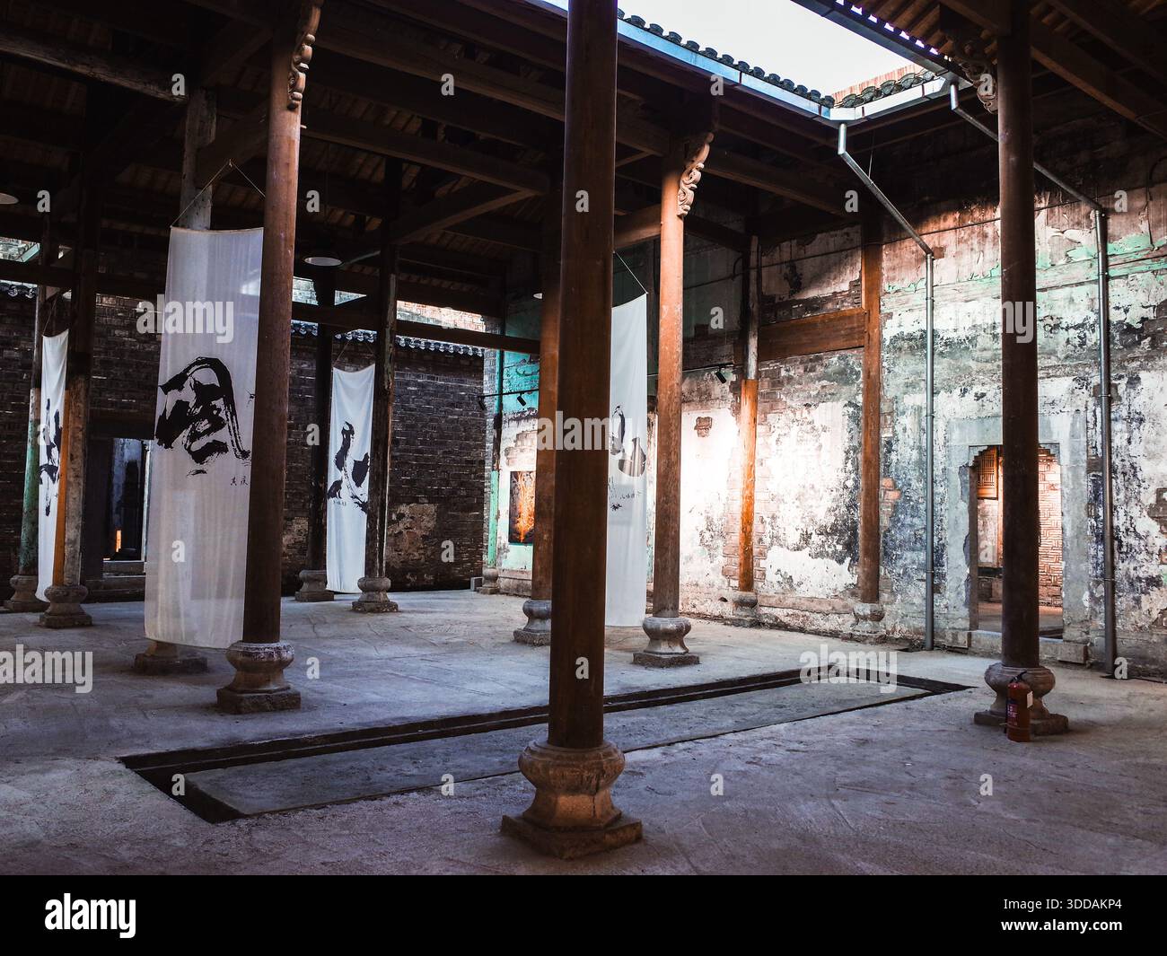 A detailed shot of the unique interior drainage system (Sishui Guitang ...