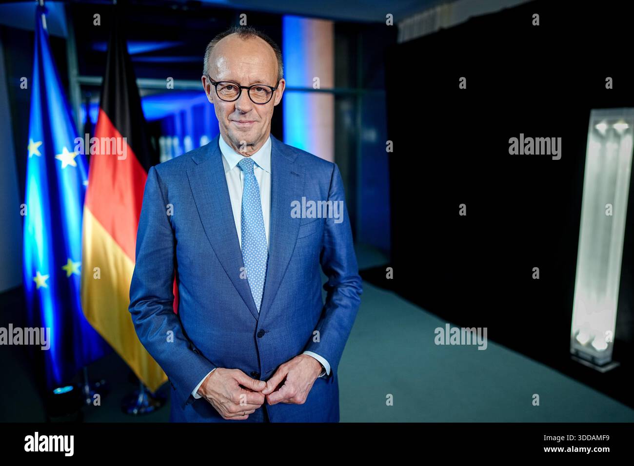 German Chancellor Friedrich Merz looks into the photographer's camera ...
