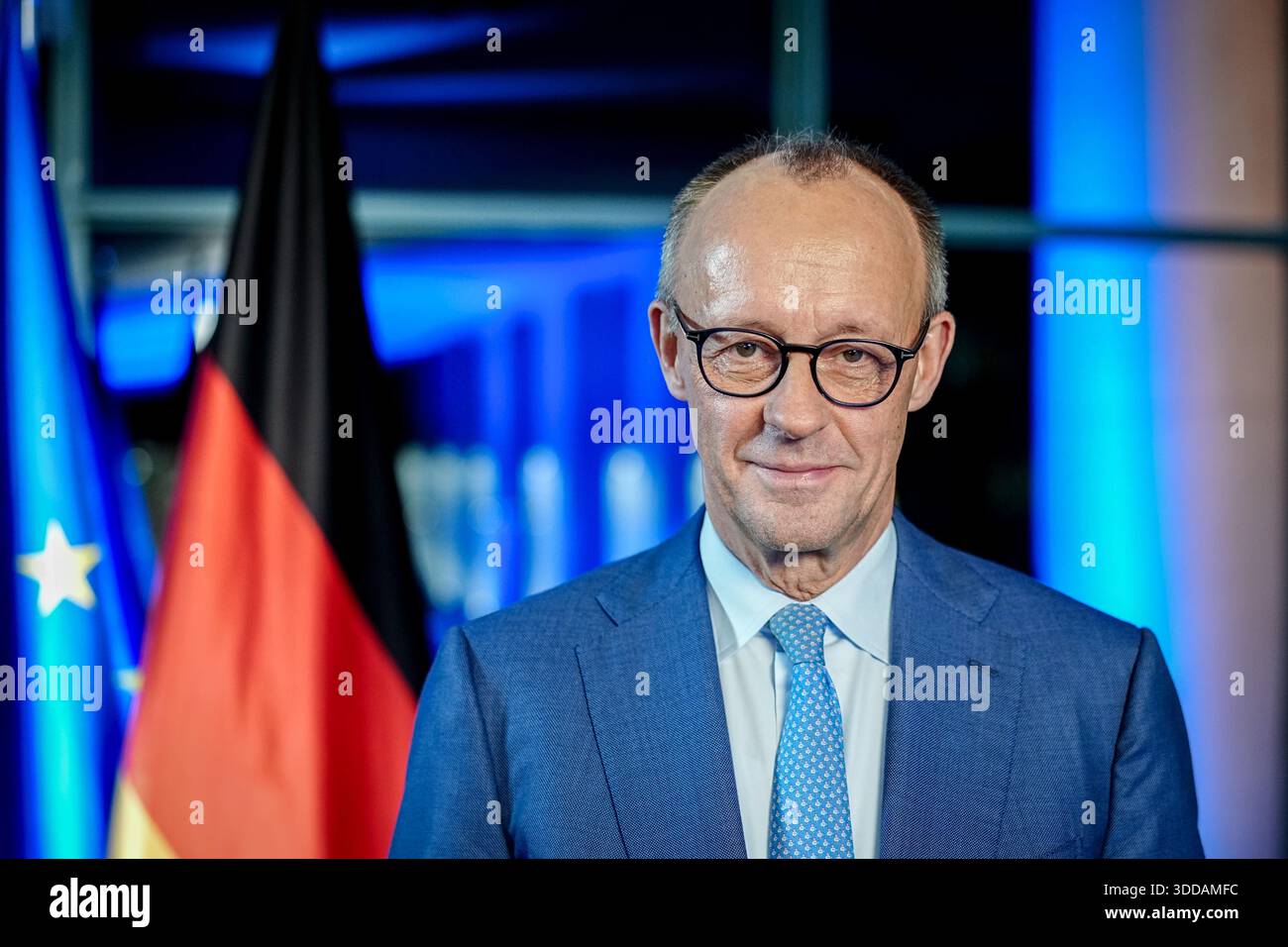 German Chancellor Friedrich Merz looks into the photographer's camera ...