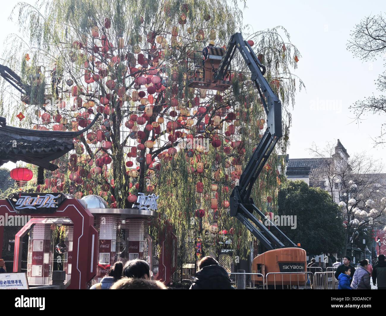 Workers install festive lanterns at Laomendong historical block in ...