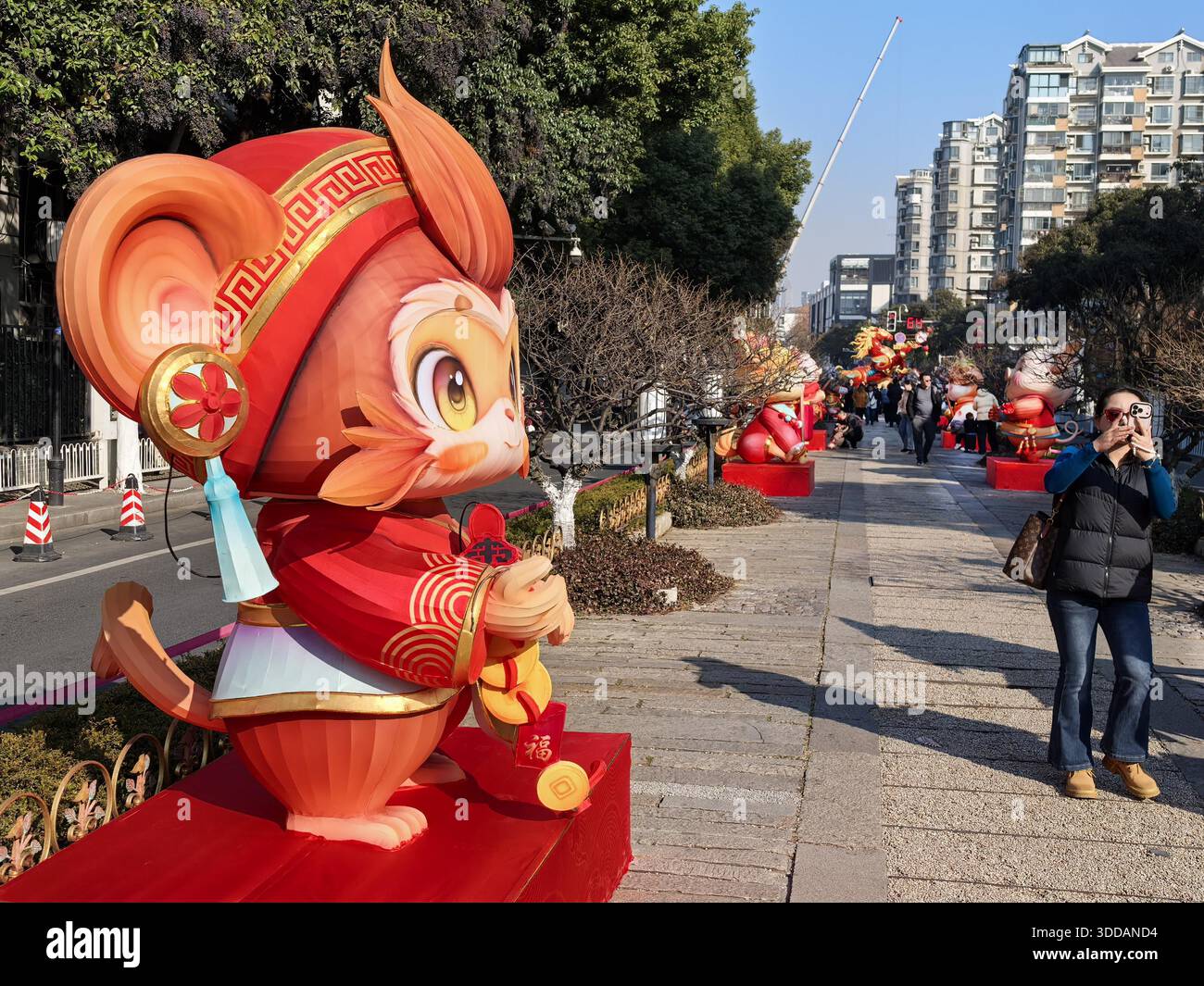 Workers install festive lanterns at Laomendong historical block in ...
