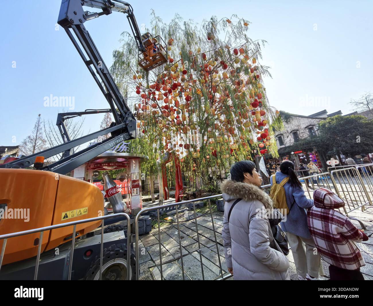 Workers install festive lanterns at Laomendong historical block in ...