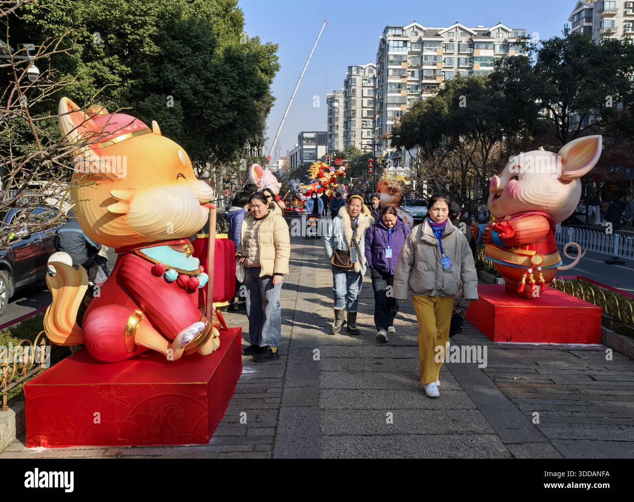 Workers install festive lanterns at Laomendong historical block in ...