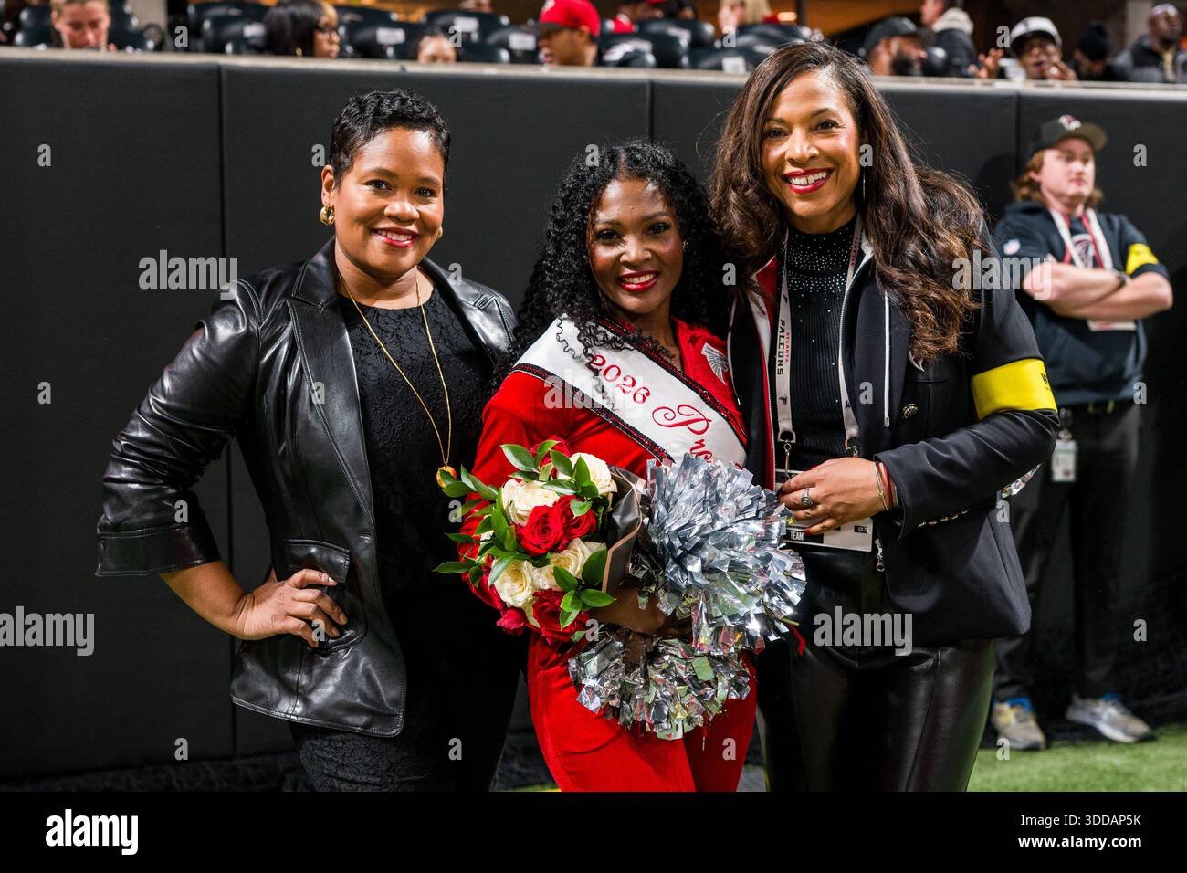 Atlanta Falcons cheerleader Madison poses for a photo with coaches ...