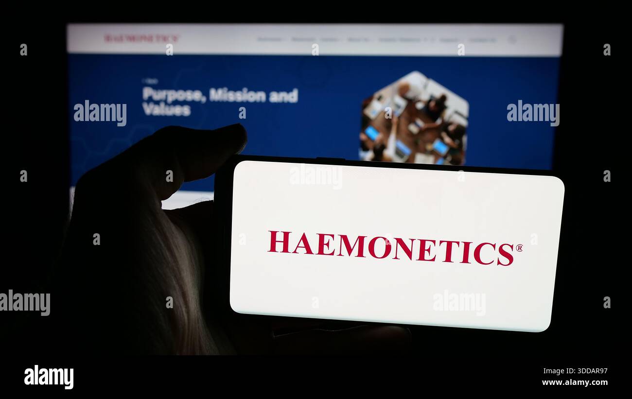 In this photo illustration, a mobile phone with the logo of US ...