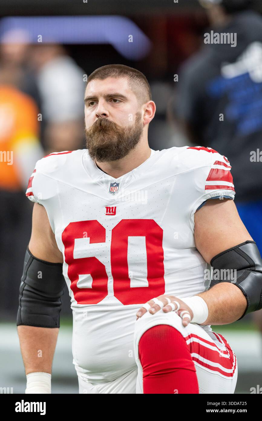 New York Giants center Bryan Hudson (60) warms up before playing ...