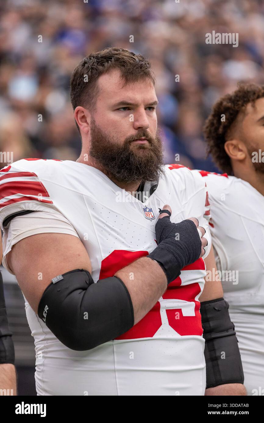 New York Giants offensive lineman Austin Schlottmann (65) stands for ...