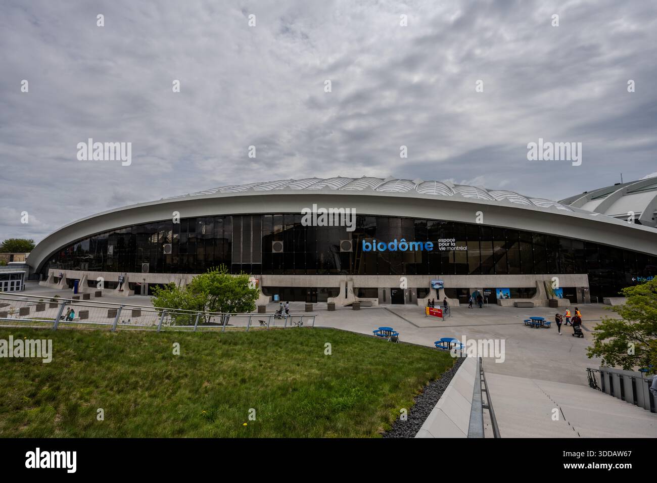 Wide view of the Montreal Biodome building with curved roof, glass ...
