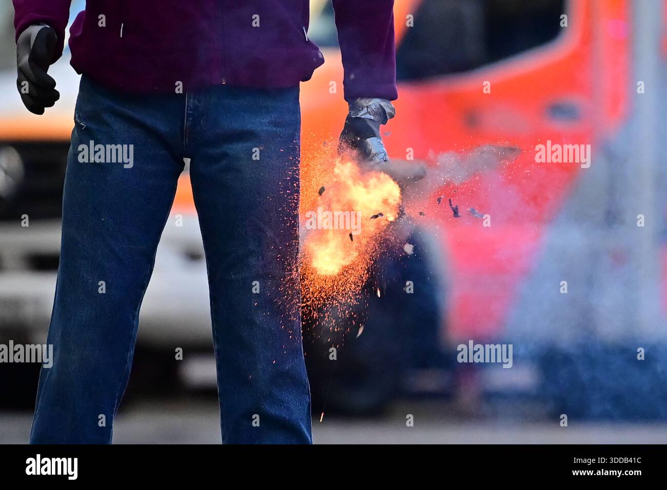 30 December 2025, Berlin: A licensed firecracker explodes on a ...