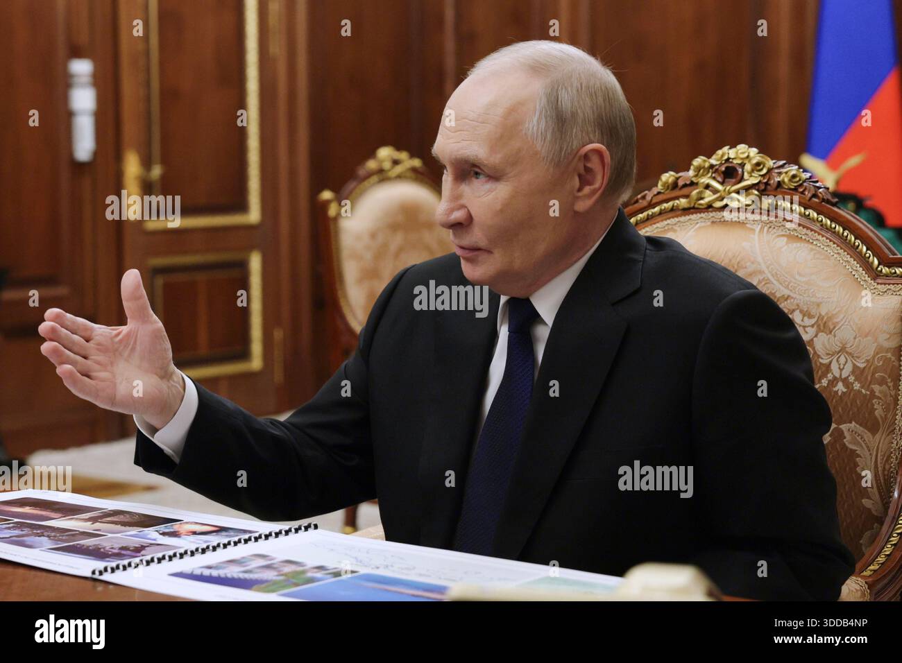 Russian President Vladimir Putin gestures while speaking to Russian ...