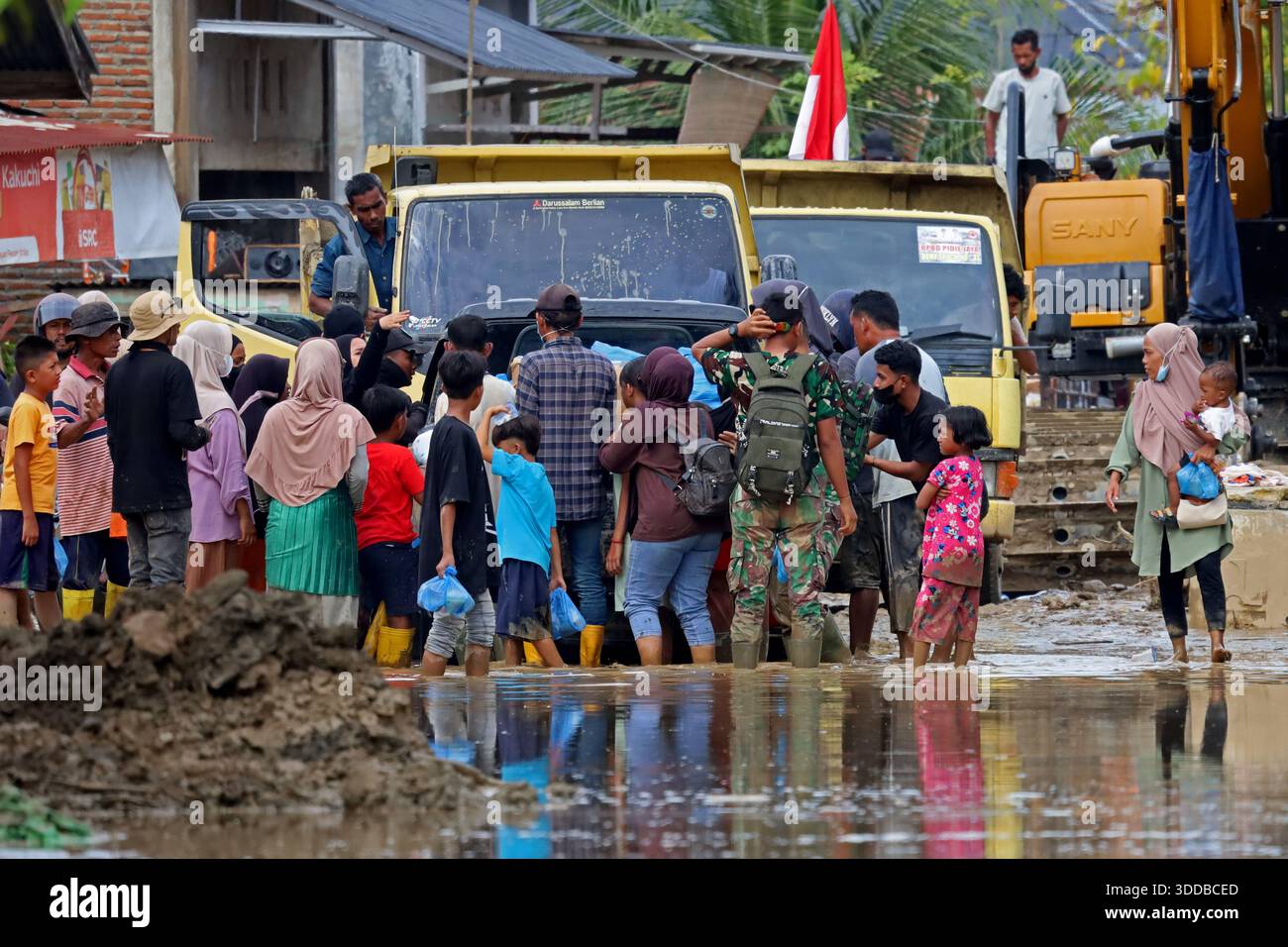 December 30, 2025, Pidie Jaya, Aceh, Indonesia: Flood victims receive ...