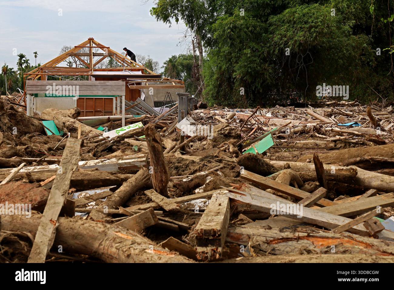 December 30, 2025, Pidie Jaya, Aceh, Indonesia: Residents repair the ...