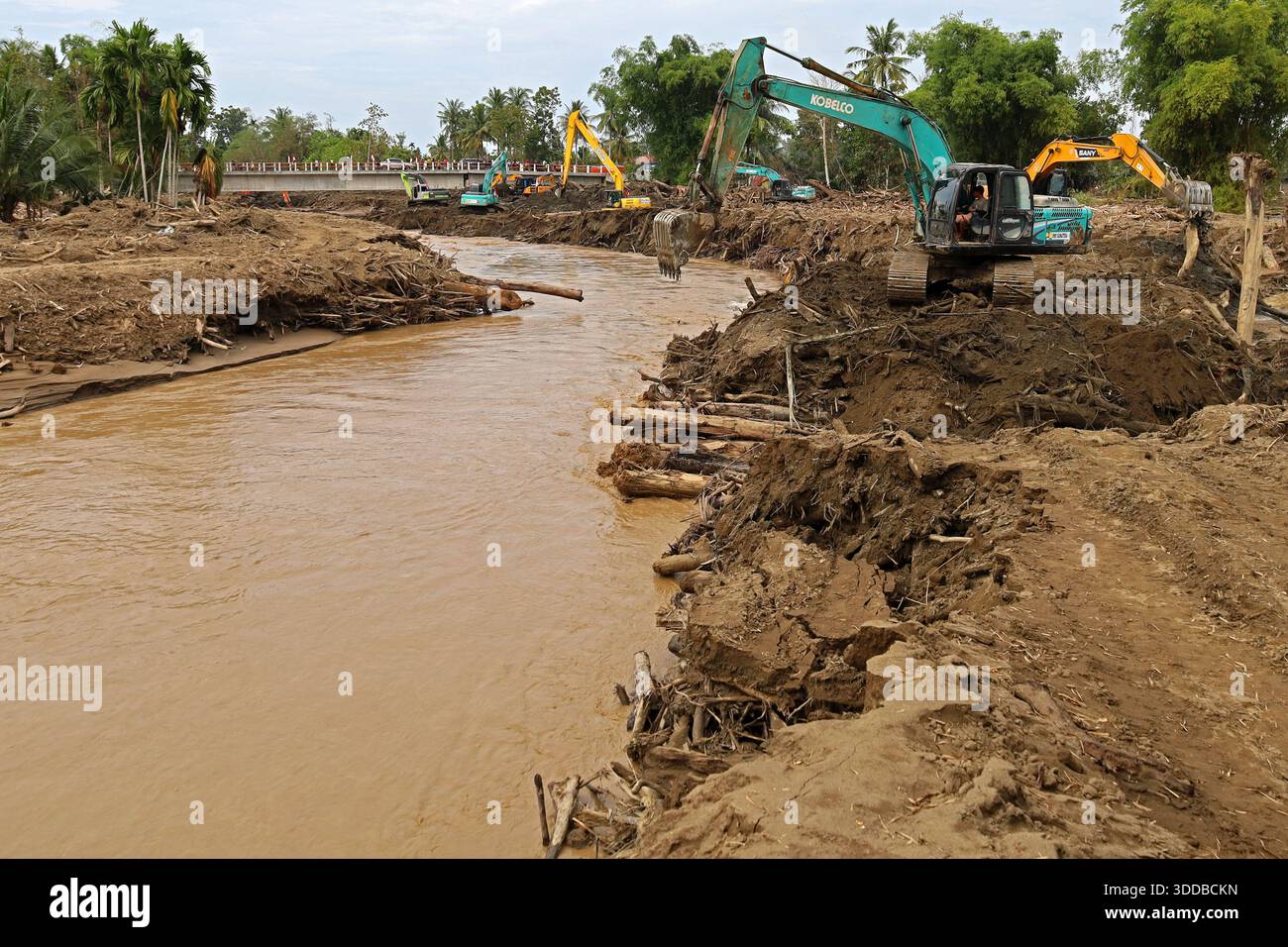 December 30, 2025, Pidie Jaya, Aceh, Indonesia: Heavy equipment workers ...