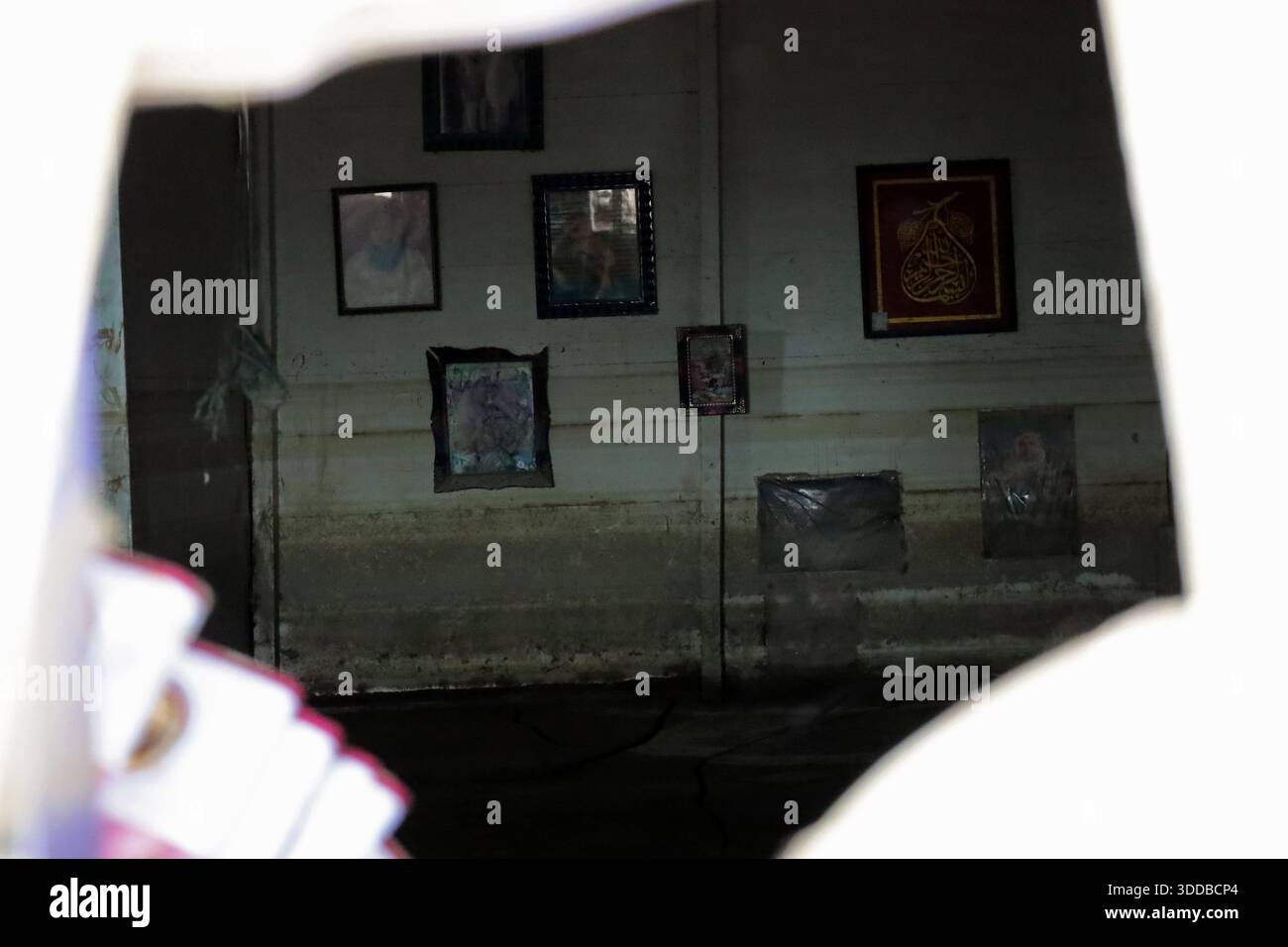 December 30, 2025, Pidie Jaya, Aceh, Indonesia: Family photo frames are ...
