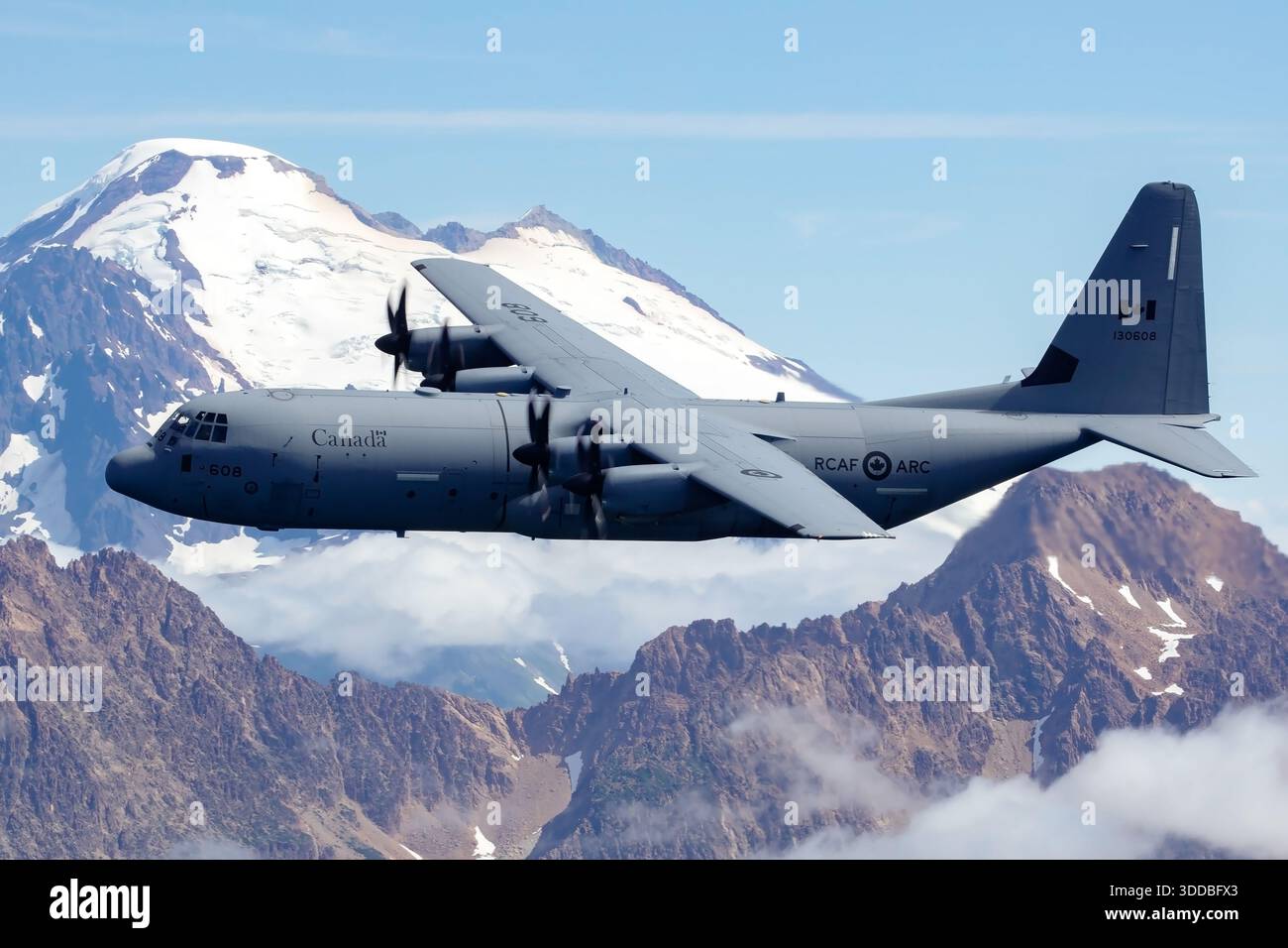 An air-to-air photograph showing a Royal Canadian Air Force Lockheed ...