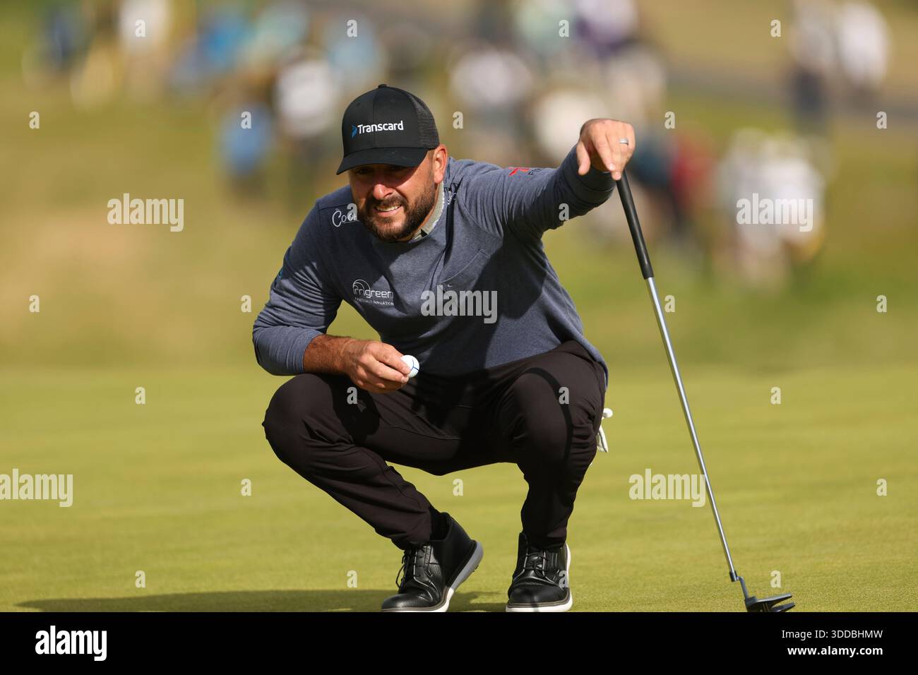 FILE - Stephan Jaeger, of Germany, looks at his putt on the first green ...