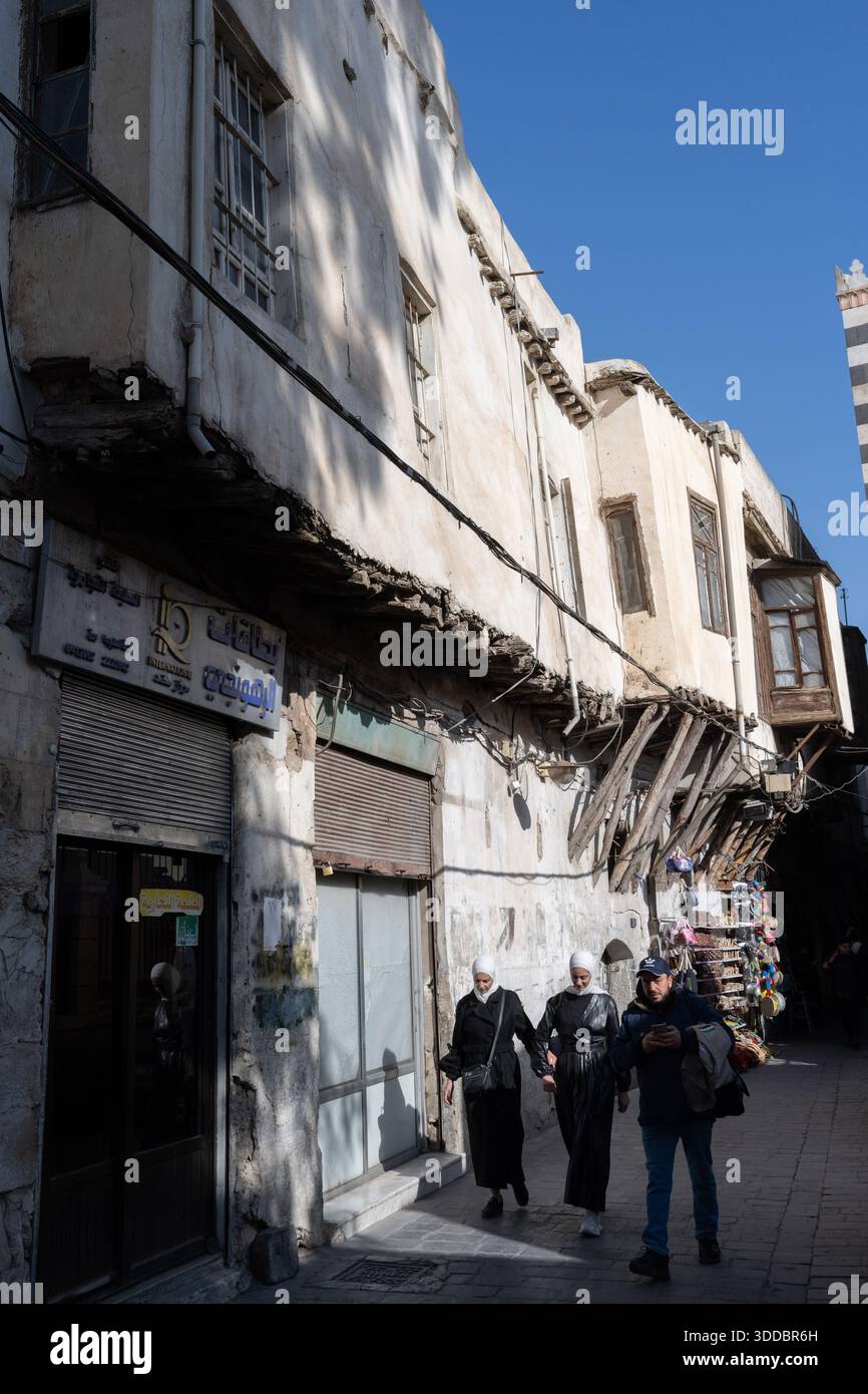 Damascus, Syria. December 4th 2025. Traditional wooden houses along a ...
