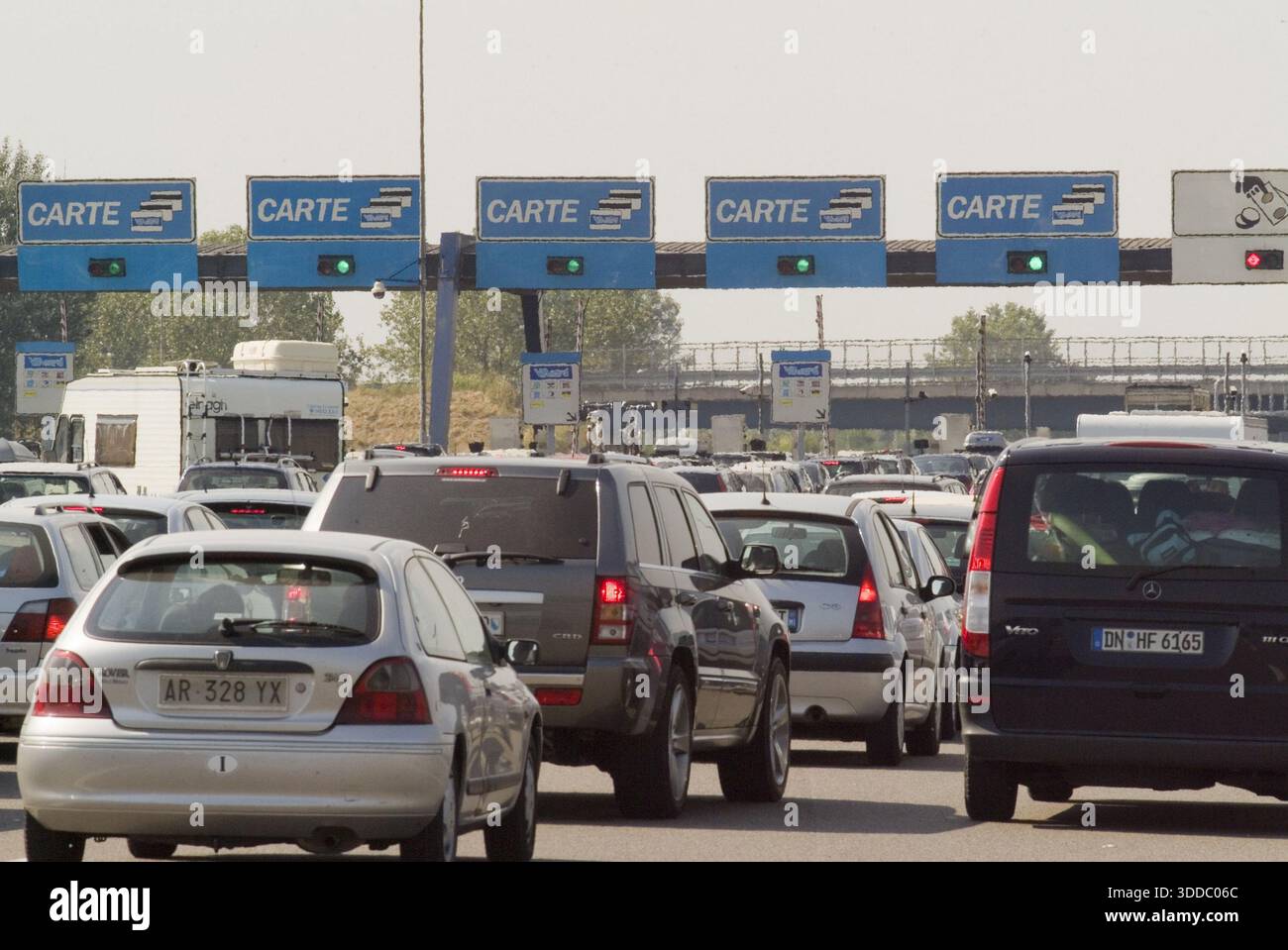 MILAN - A queue of cars and traffic at the Melegnano toll booth on the ...