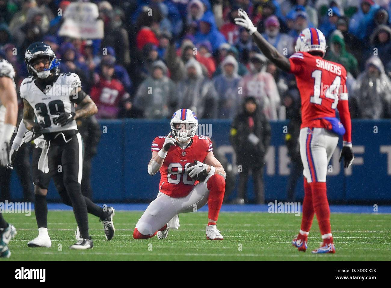 Buffalo Bills tight end Dawson Knox, center, and wide receiver Tyrell ...