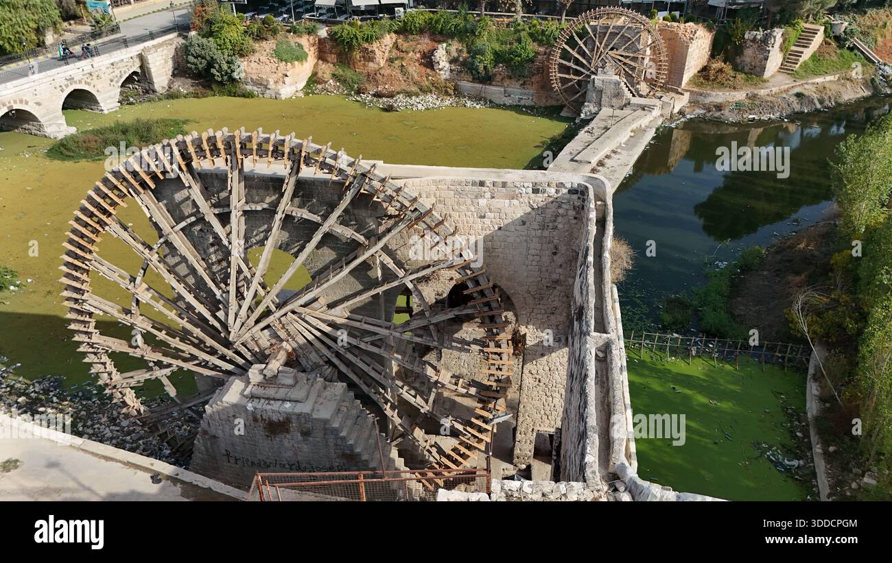 The historic Noria waterwheel on Orontes river in Hama city, Syria, on ...