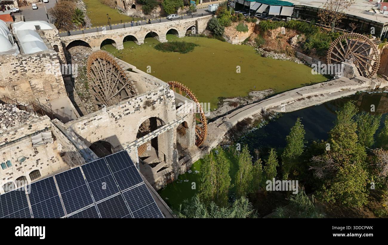 The historic Noria waterwheel on Orontes river in Hama city, Syria, on ...