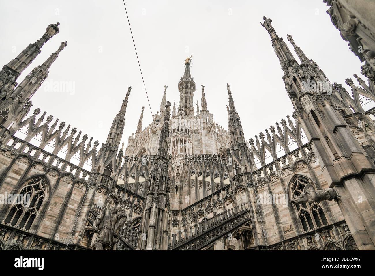 The spires of Milan Cathedral are seen from the terraces with the ...