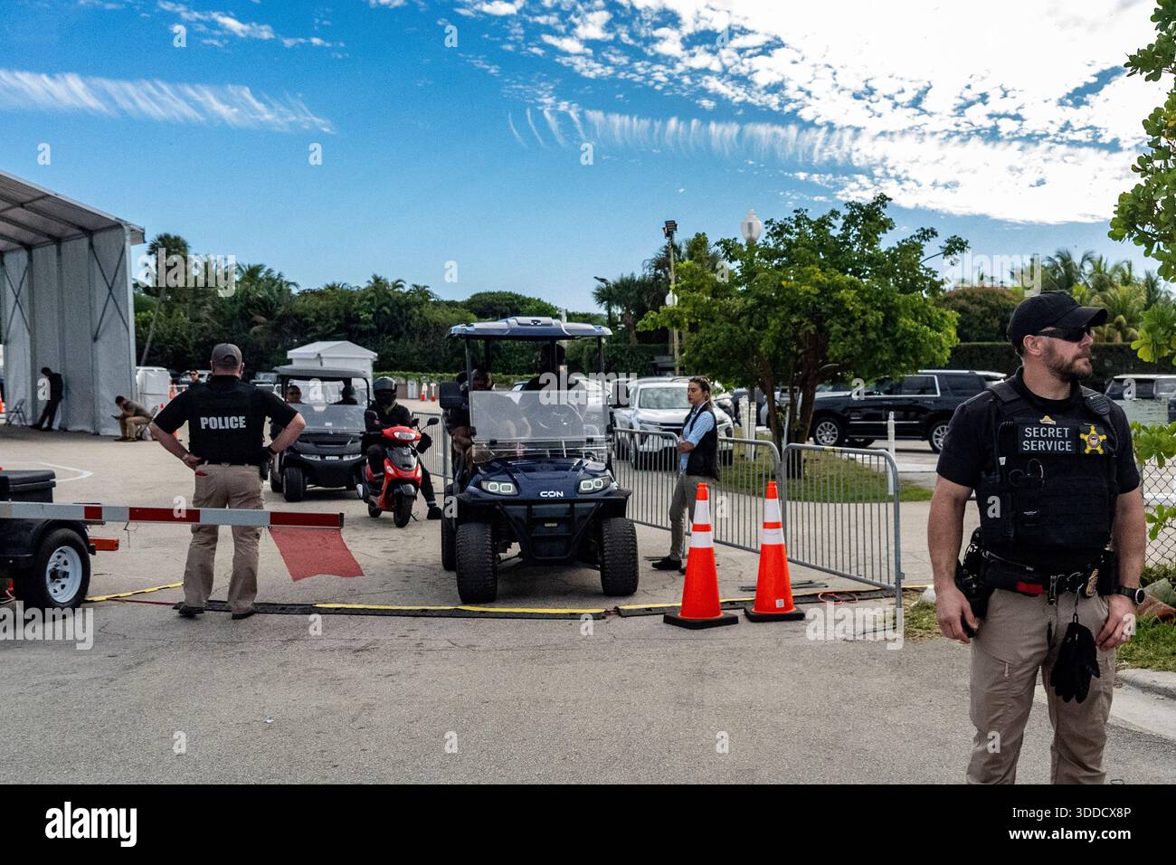 Law enforcement stand at a check point outside of President Donald ...