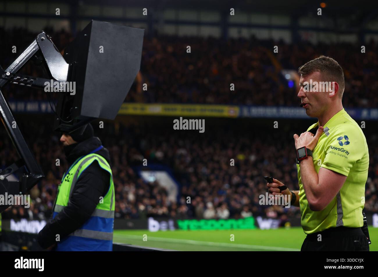 London, England, 30th December 2025. Samuel Barrott checks the pitch ...