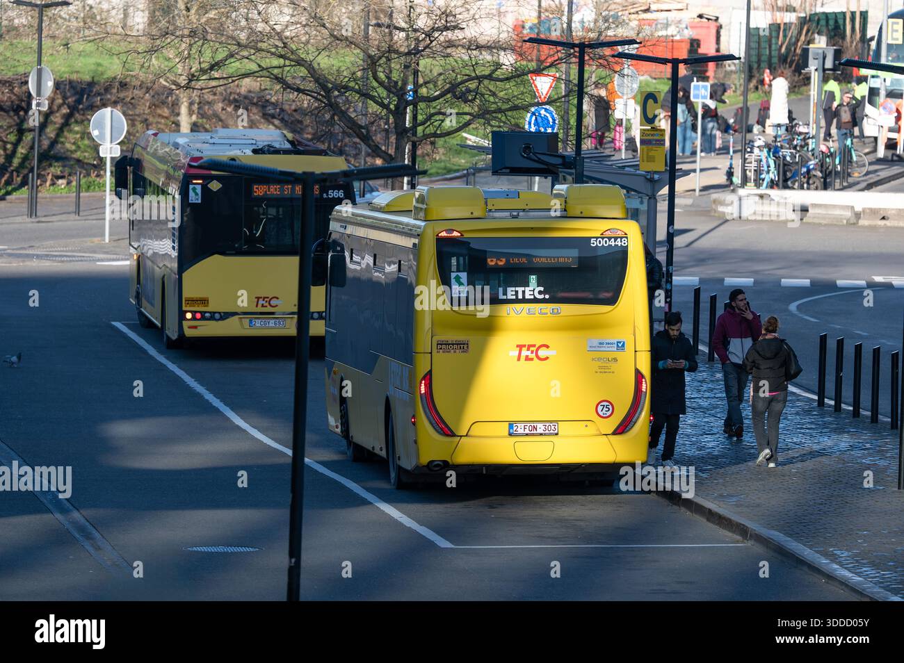 TEC buses and trams at their stop in front of Liège-Guillemins railway ...