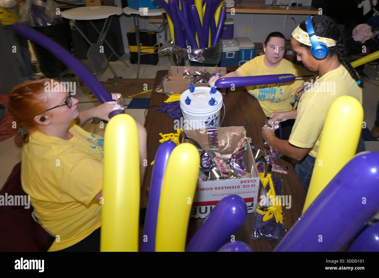 Members of the 2026 Balloon Affairs Crew inflate balloons the day ...