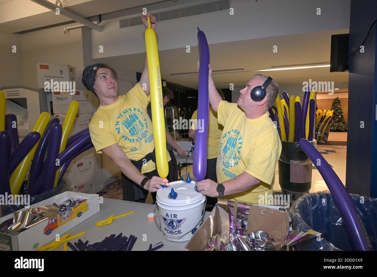 Members of the 2026 Balloon Affairs Crew inflate balloons the day ...