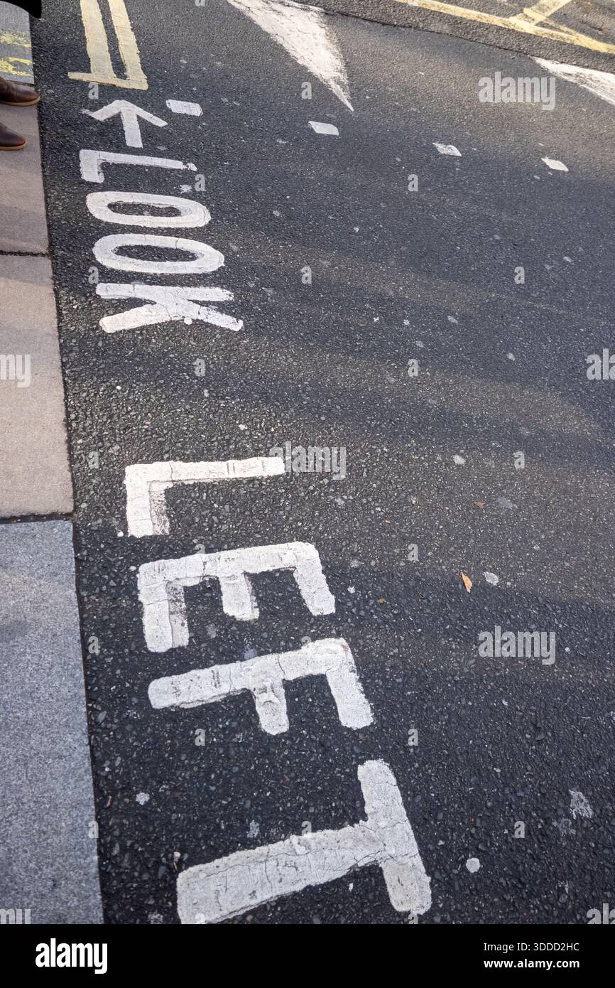 Roads markings in England for pedestrians to "Look Right" or "Look Left ...