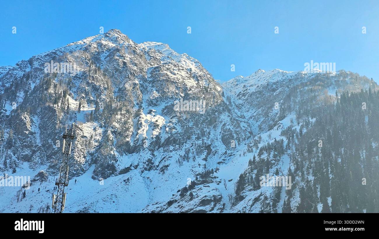 Tourists enjoy a walk at snow mountain after a heavy snowfall at ...