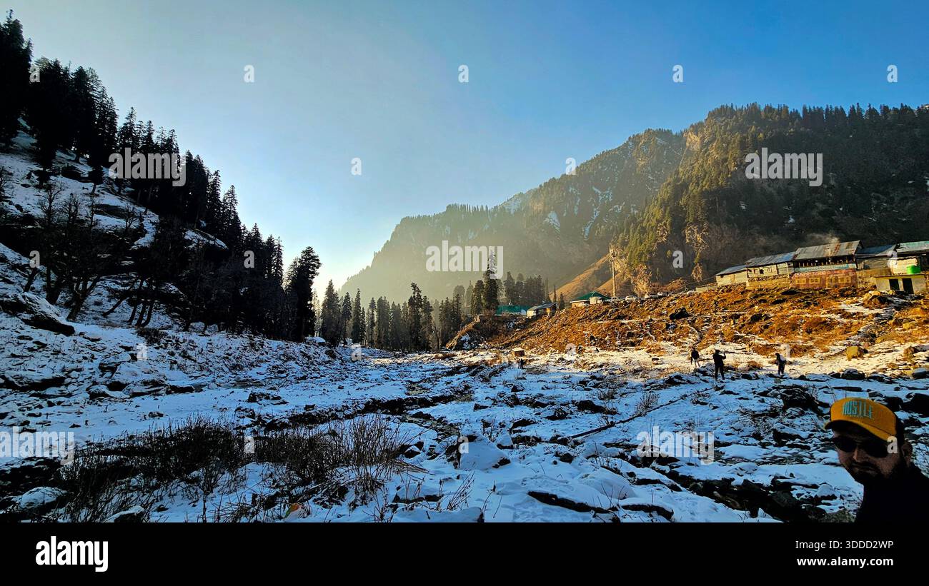 Tourists enjoy a walk at snow mountain after a heavy snowfall at ...