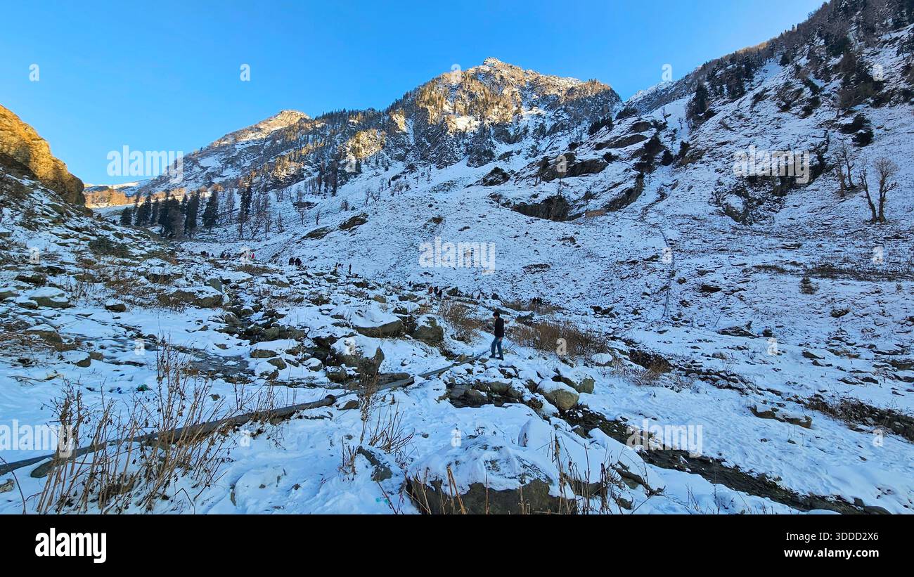 Tourists enjoy a walk at snow mountain after a heavy snowfall at ...