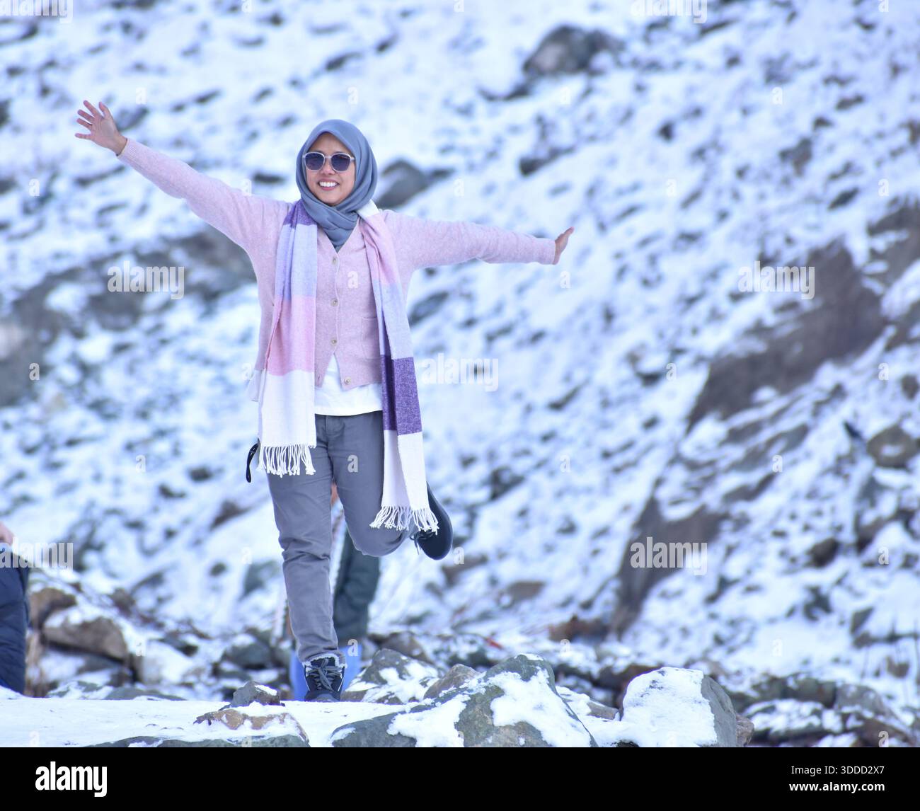 Tourists enjoy a walk at snow mountain after a heavy snowfall at ...