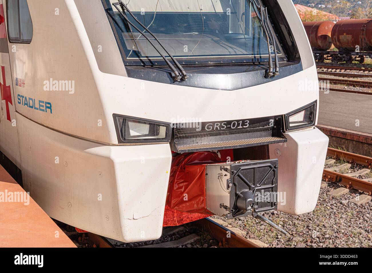 4 November 2025, Batumi, Georgia: Commuter train front with headlights ...