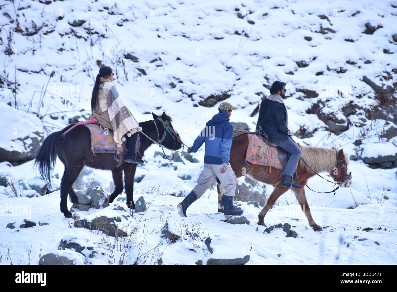 Tourists enjoy a walk at snow mountain after a heavy snowfall at ...