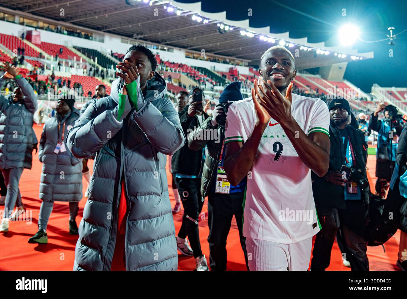 Victor Osimhen of Nigeria and Wilfred Ndidi of Nigeria thank their fans ...
