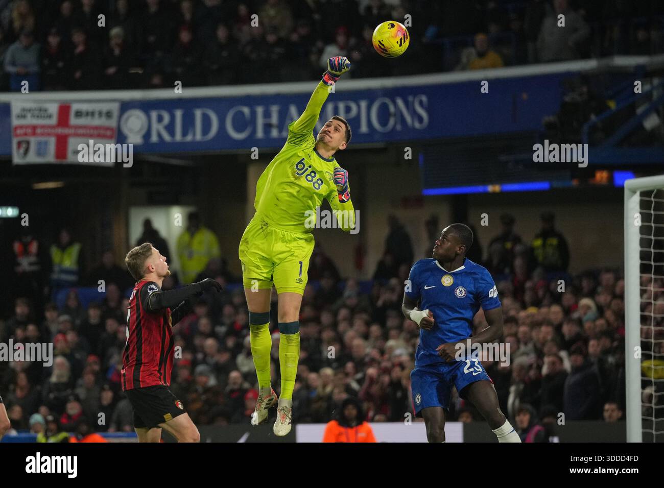 Bournemouth's goalkeeper Dorde Petrovic, center, clears the ball during ...