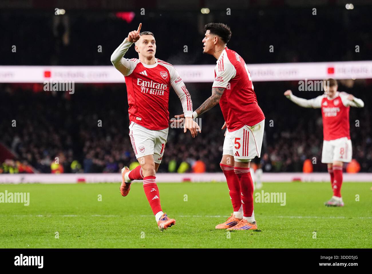 Arsenal's Leandro Trossard celebrates scoring their side's third goal ...