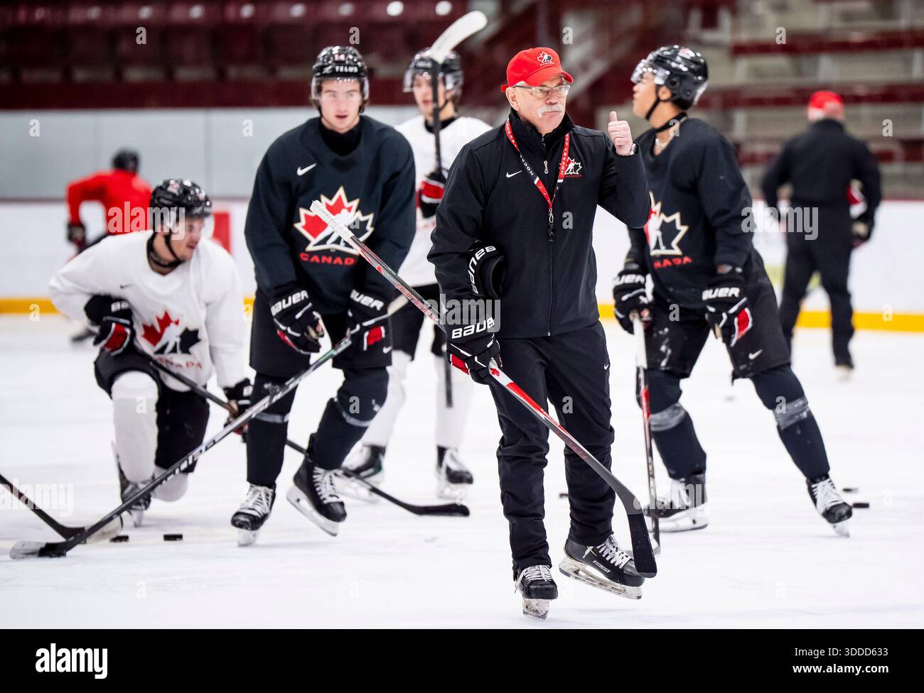 Team Canada assistant coach Gardiner MacDougall gestures at a practice ...