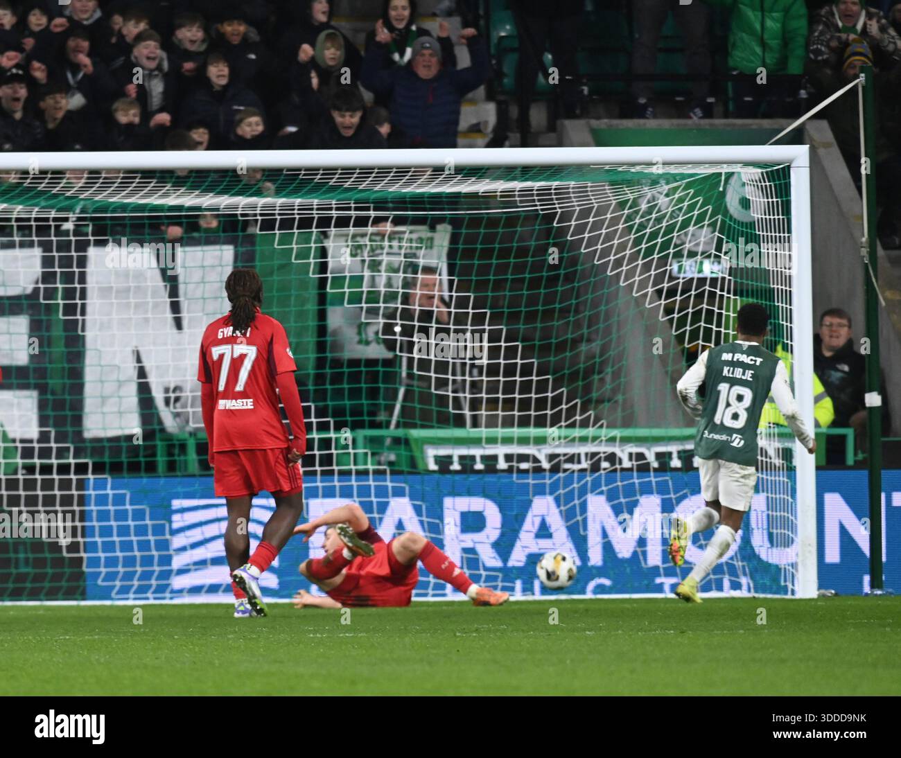 Aberdeenthibault klidje of hibs scores opening goal hi-res stock ...