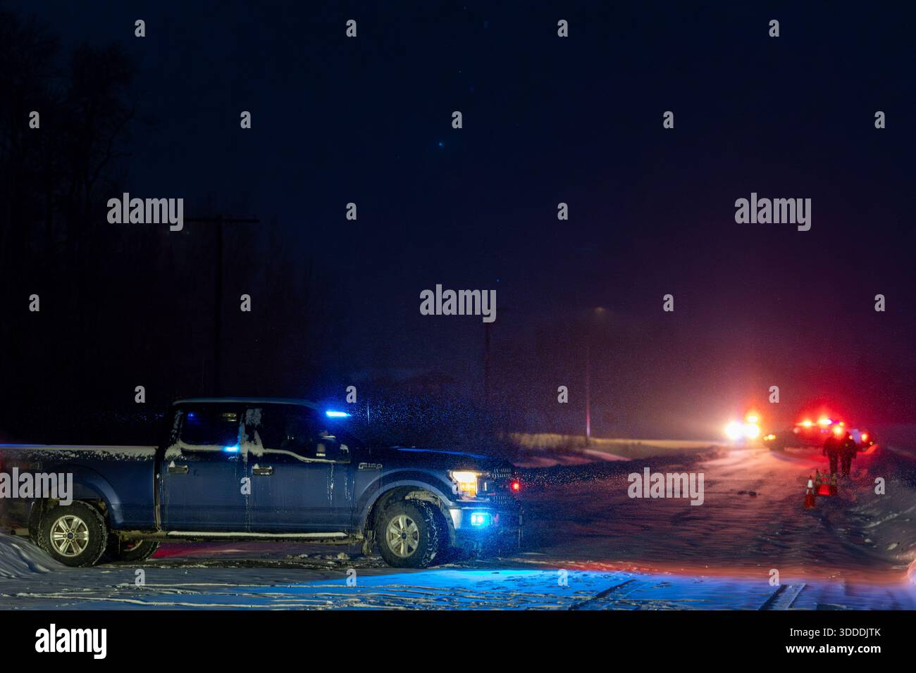 A RCMP road blockade is shown at Big Island Lake Cree Nation, 392 ...