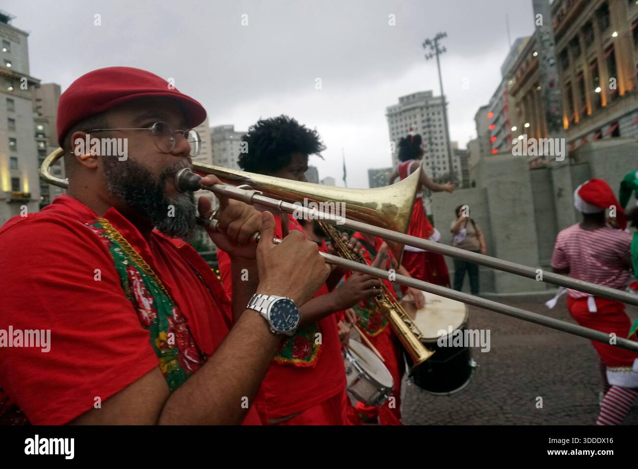People participate in a Christmas parade in Sao Paulo, Brazil, 23 ...