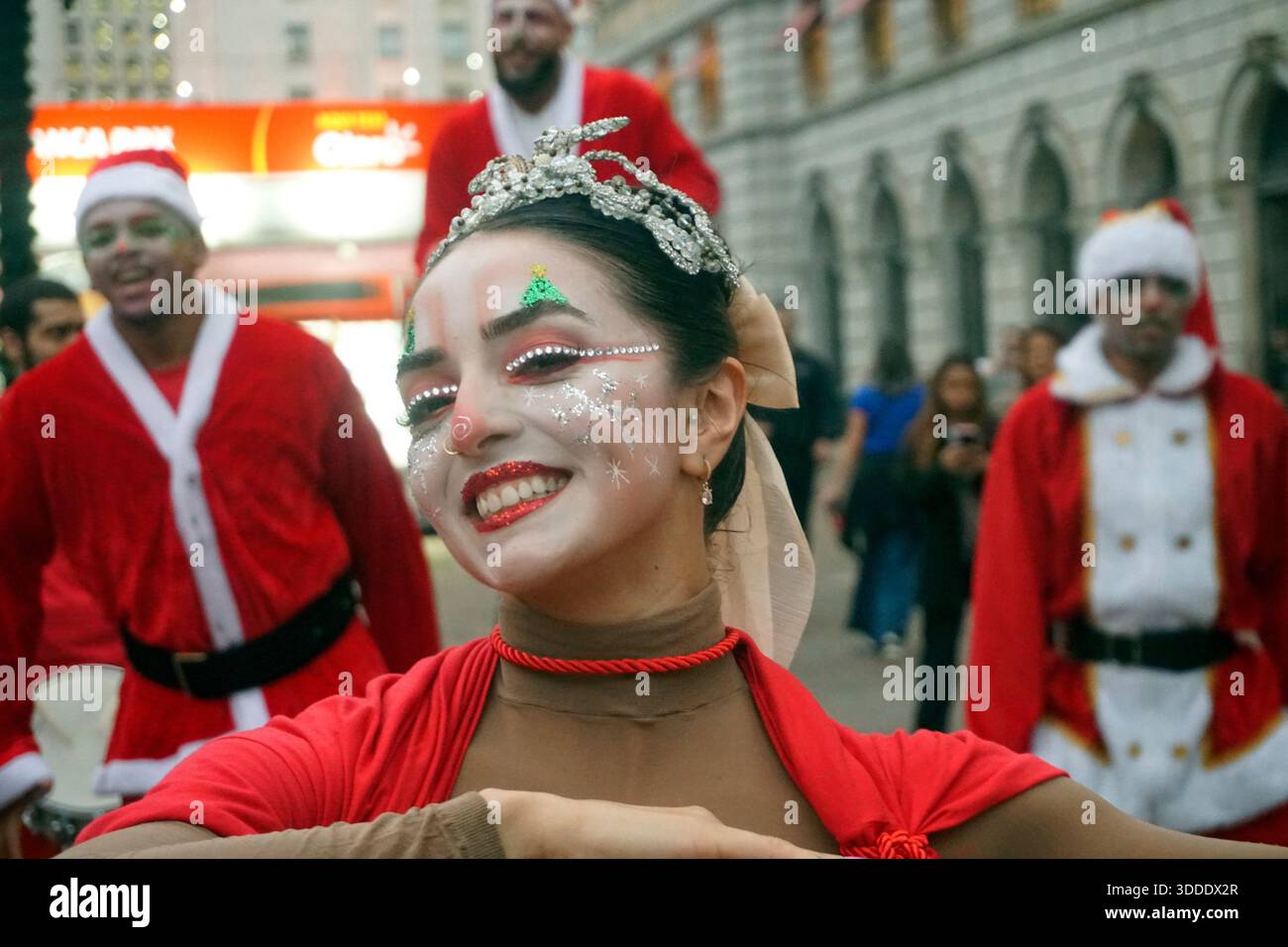 People participate in a Christmas parade in Sao Paulo, Brazil, 23 ...