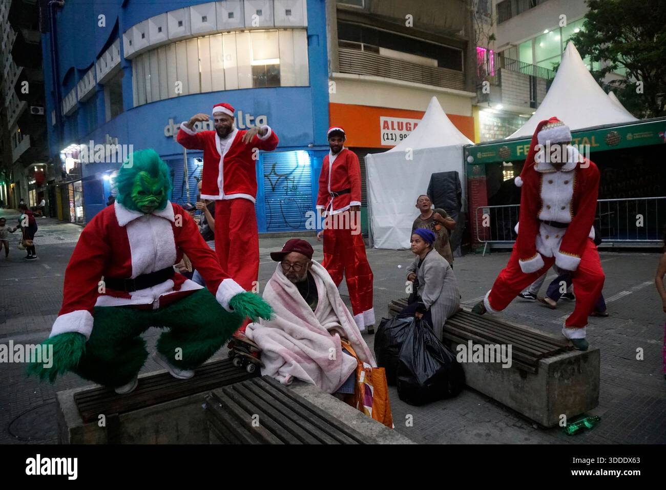 People participate in a Christmas parade in Sao Paulo, Brazil, 23 ...